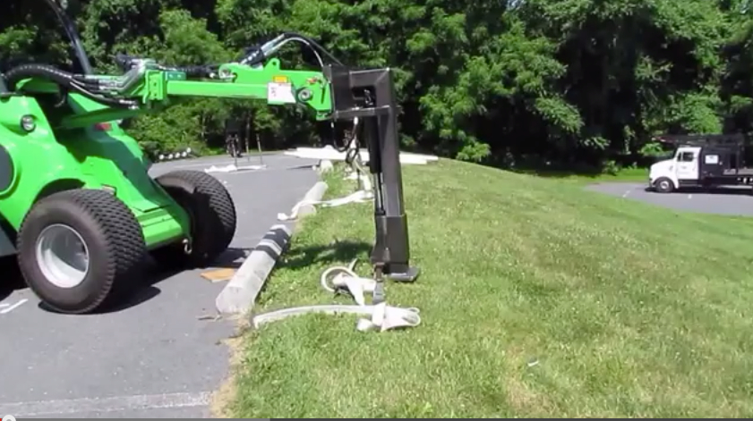 stake puller on asphalt parking lot - Tent OX™